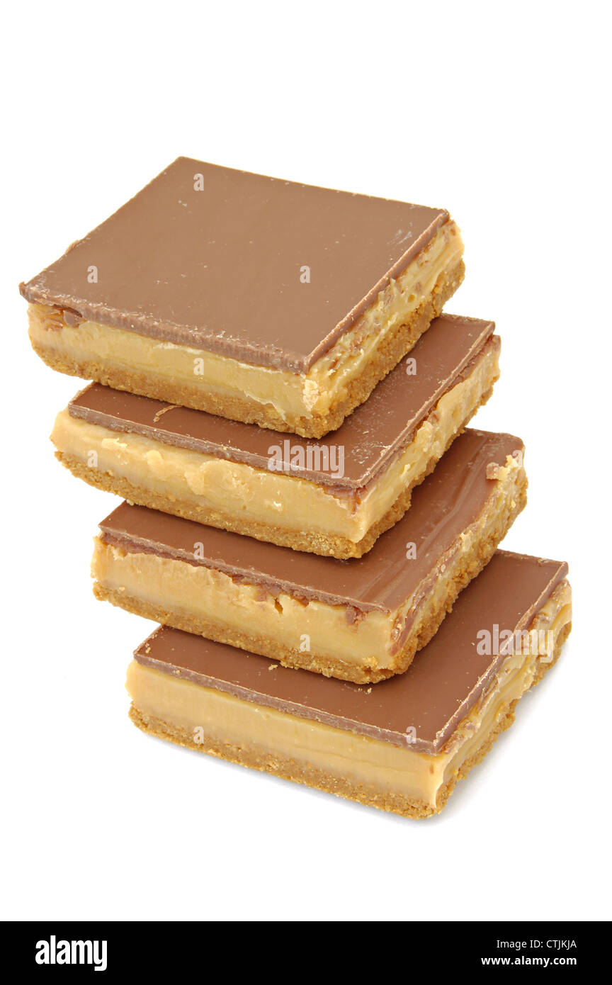 Stack of chocolate caramel slices isolated on a white background Stock ...