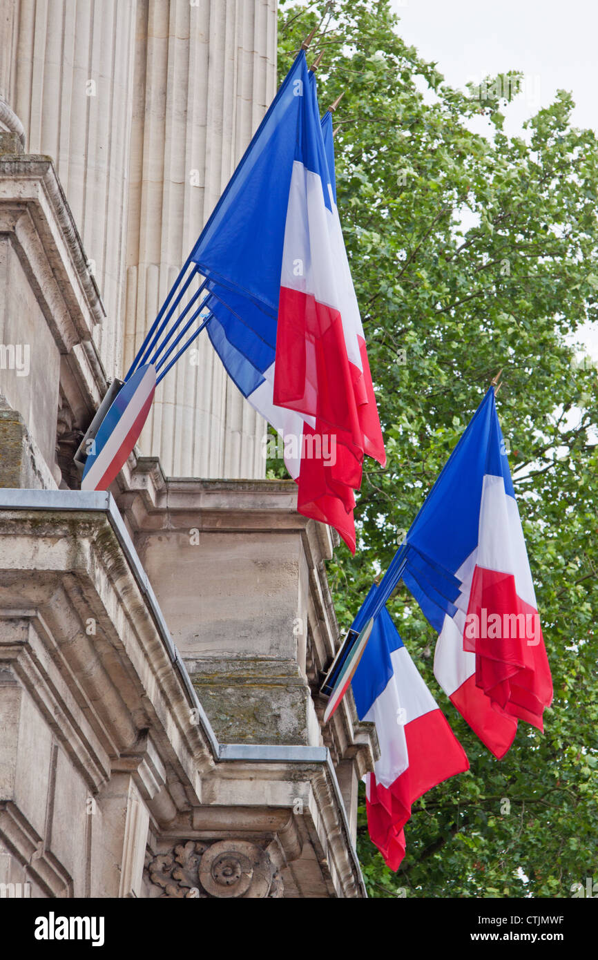 Clusters of national flags adorn the Prefecture in Lille, France in ...