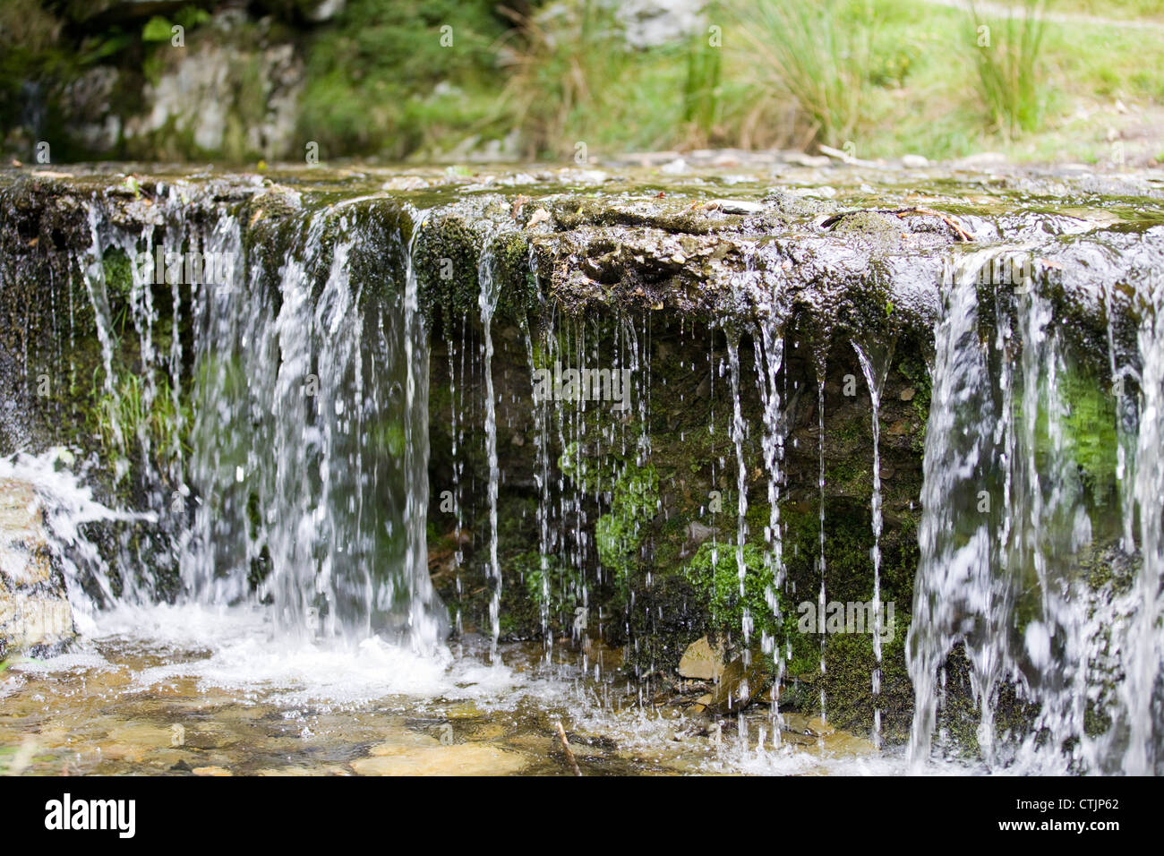 Mini waterfall in a valley in wales Stock Photo - Alamy