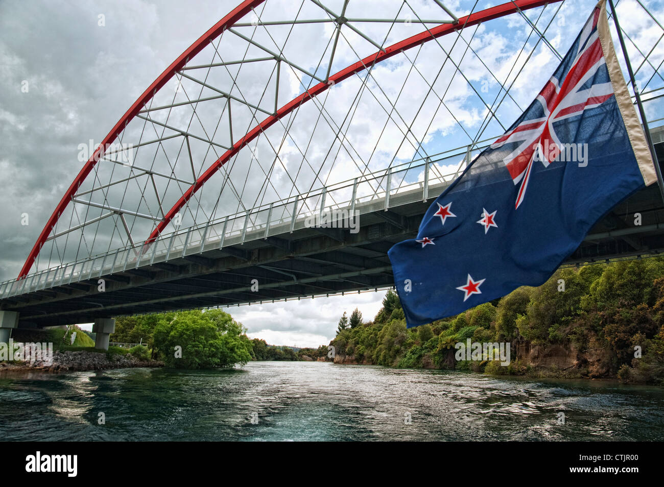 Bridge Over Waikato River With The New Zealand Flag; Taupo, New Zealand ...
