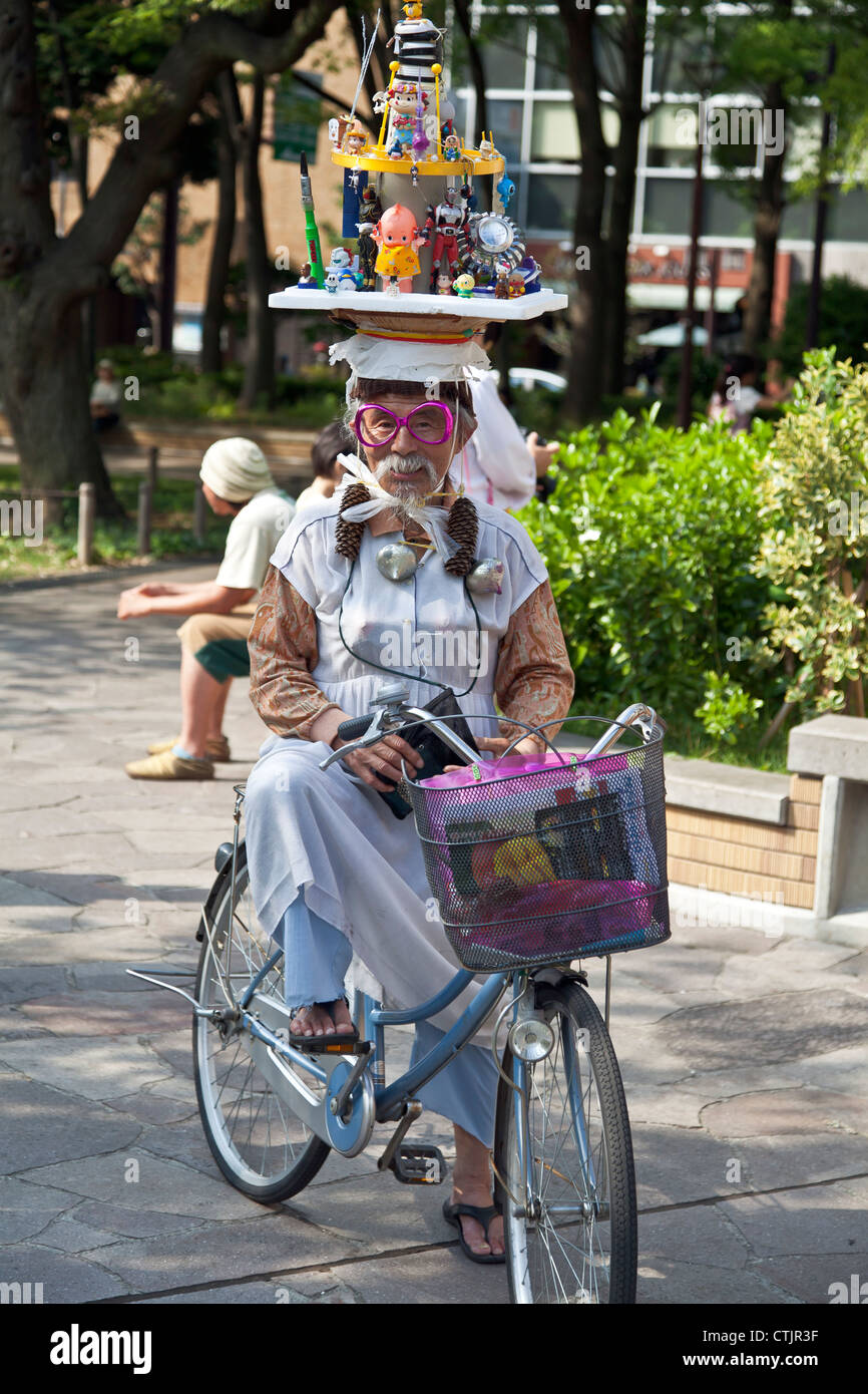 Eccentric man posing for pictures at Yokohama park, Japan Stock Photo ...