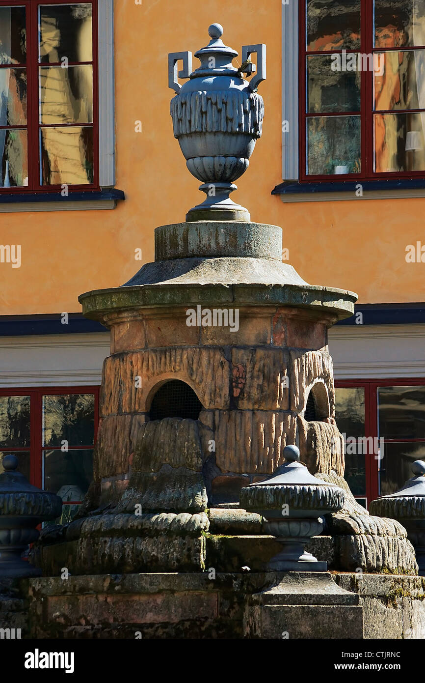 Medieval stone vase, decoration of ancient well Stock Photo - Alamy