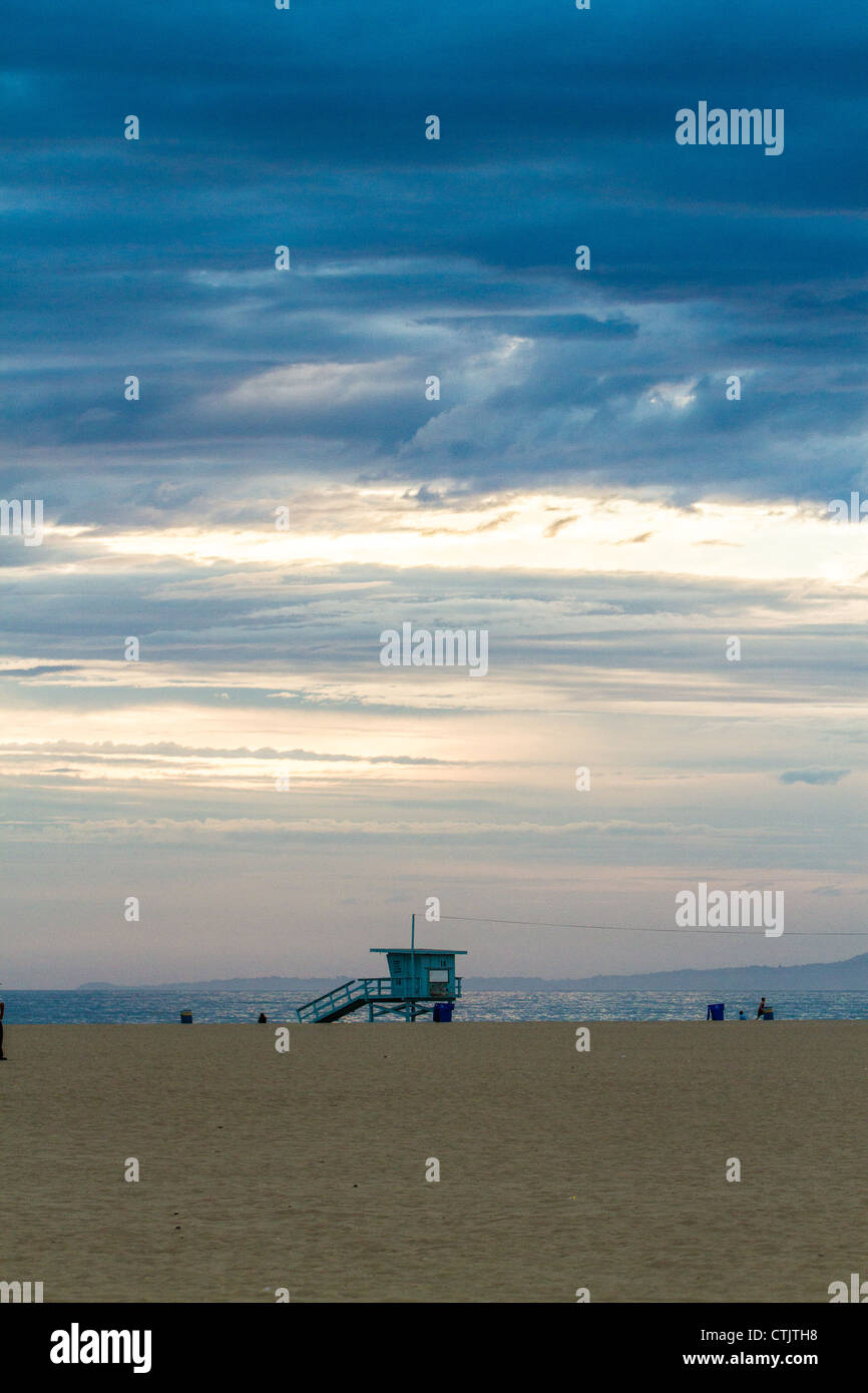 A lifeguard shack on the beach in Santa Monica California with clouds ...