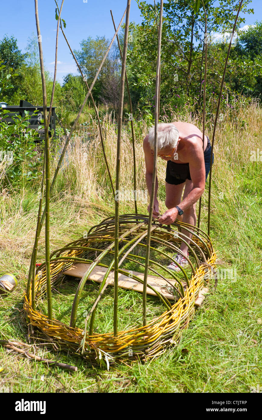 Building a coracle, a traditional boat made of willow withies covered ...