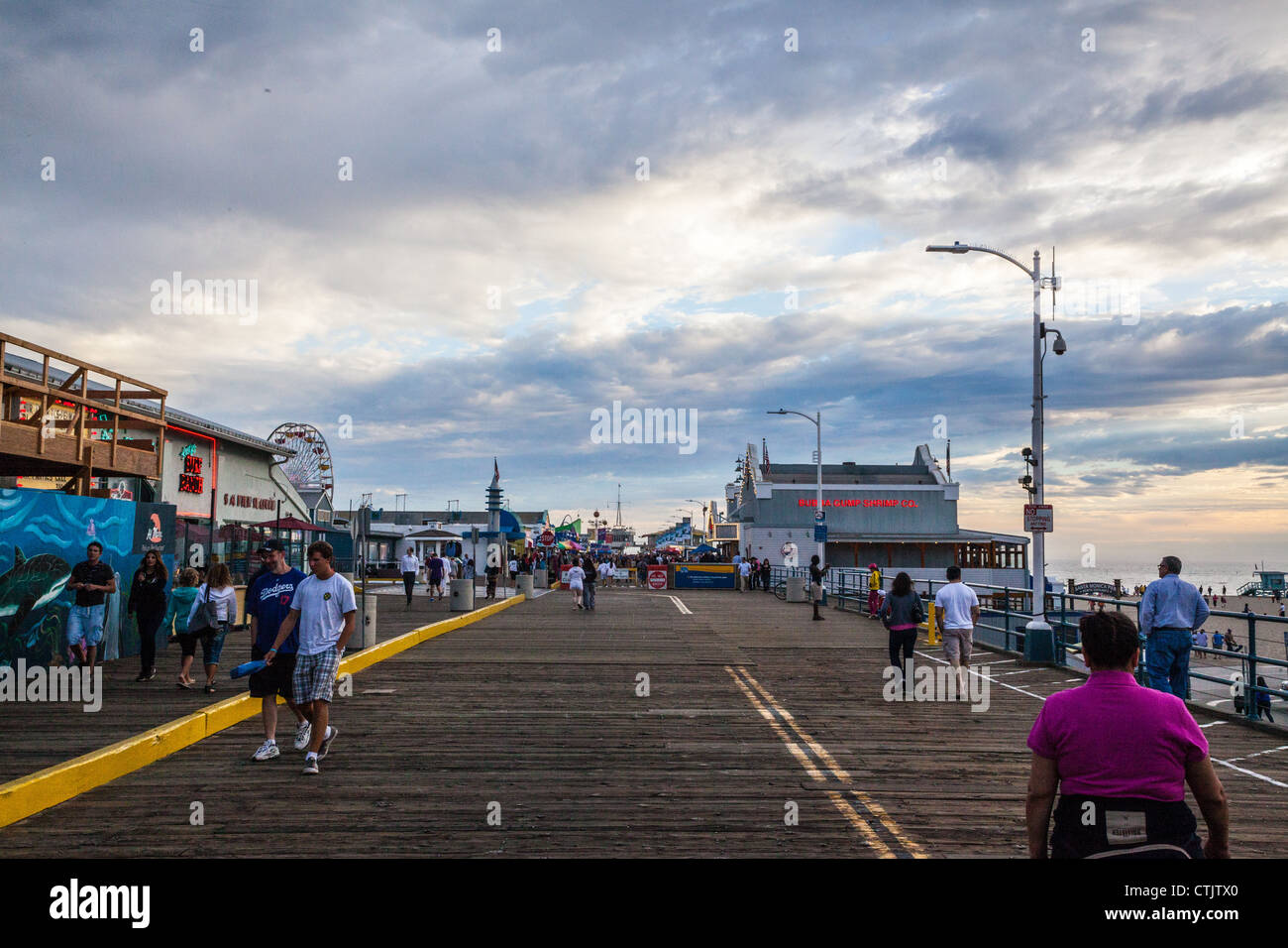 The Santa Monica pier in Santa Monica California with clouds from the ...