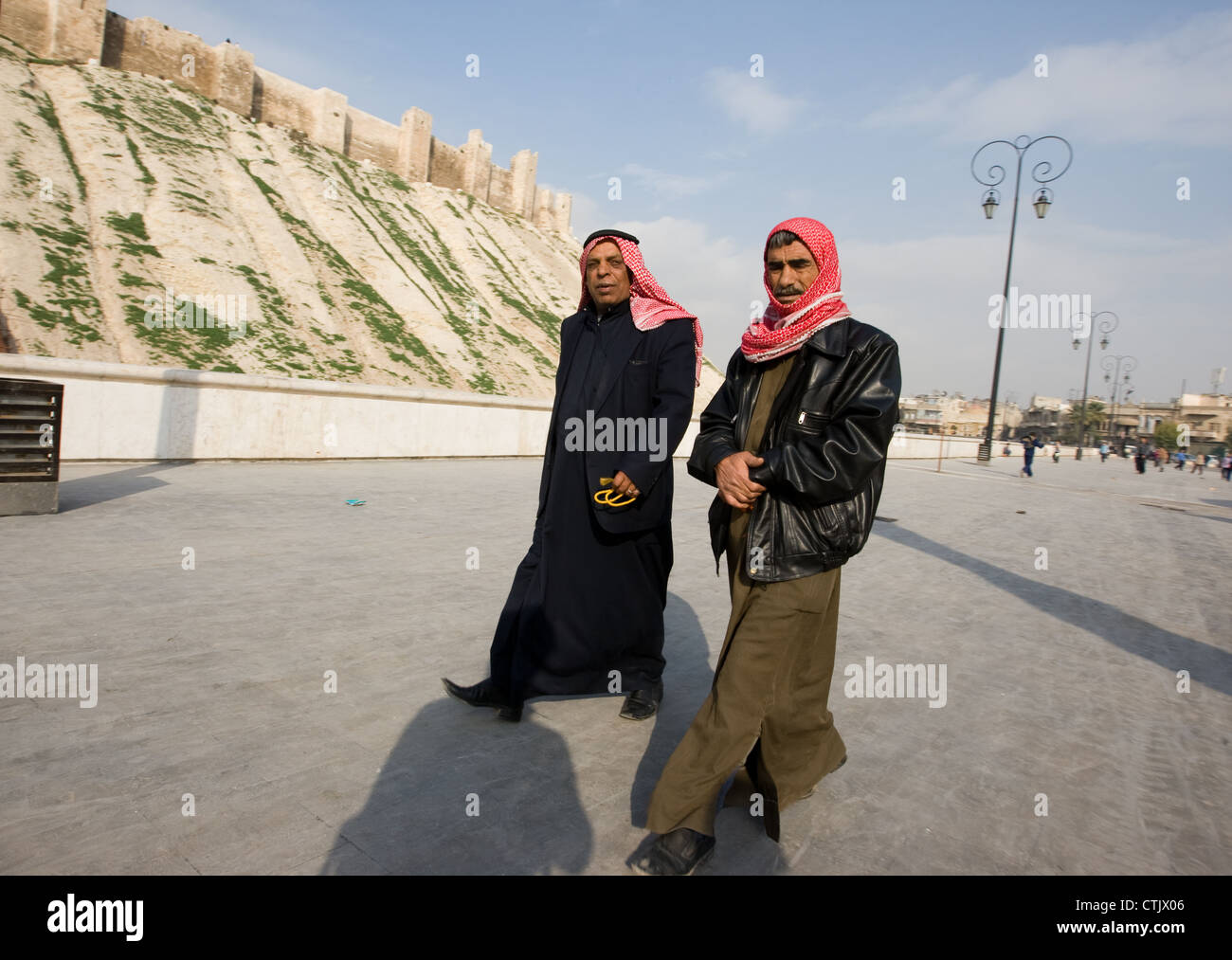 Muslim man walking hi-res stock photography and images - Alamy