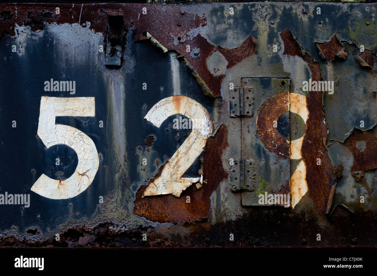Numbers painted on the side of a railroad train car Stock Photo - Alamy