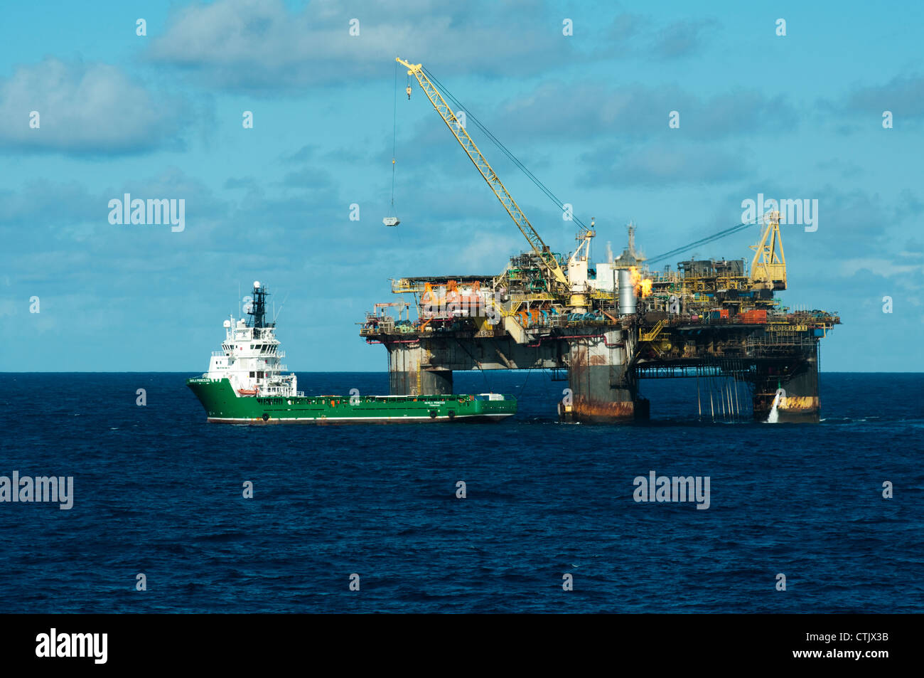 Oil Rig PXX from Petrobras, with supply vessel along side during ...