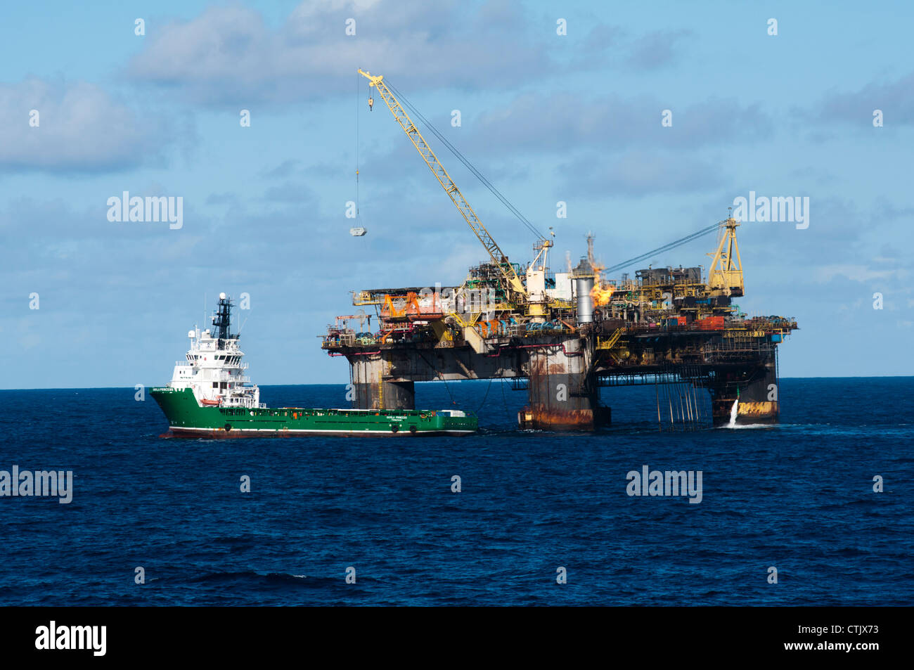 Oil Rig PXX from Petrobras, with supply vessel along side during ...