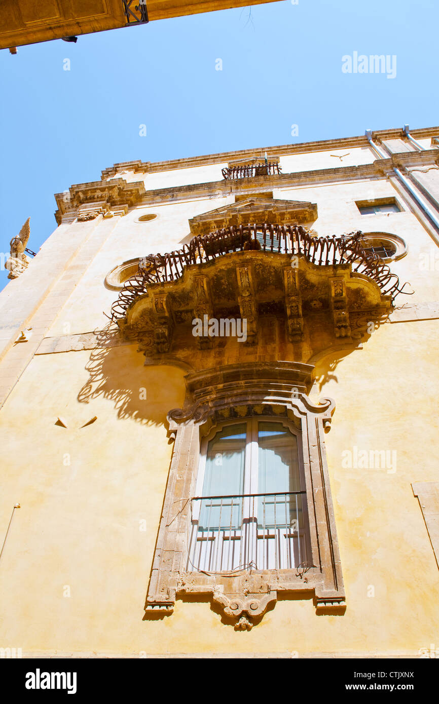 old window in baroque style house, Noto, Italy Stock Photo - Alamy
