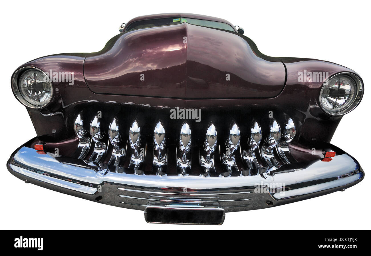 Wide-angle close up of the radiator grille of an American car from the ...