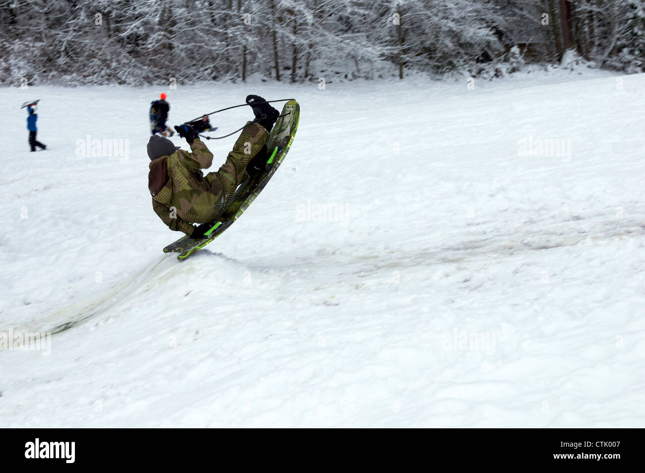 Snow sled jump hi-res stock photography and images - Alamy