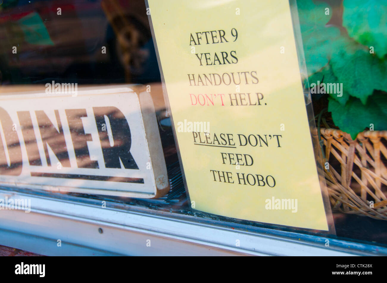 humorous sign in store window Stock Photo - Alamy