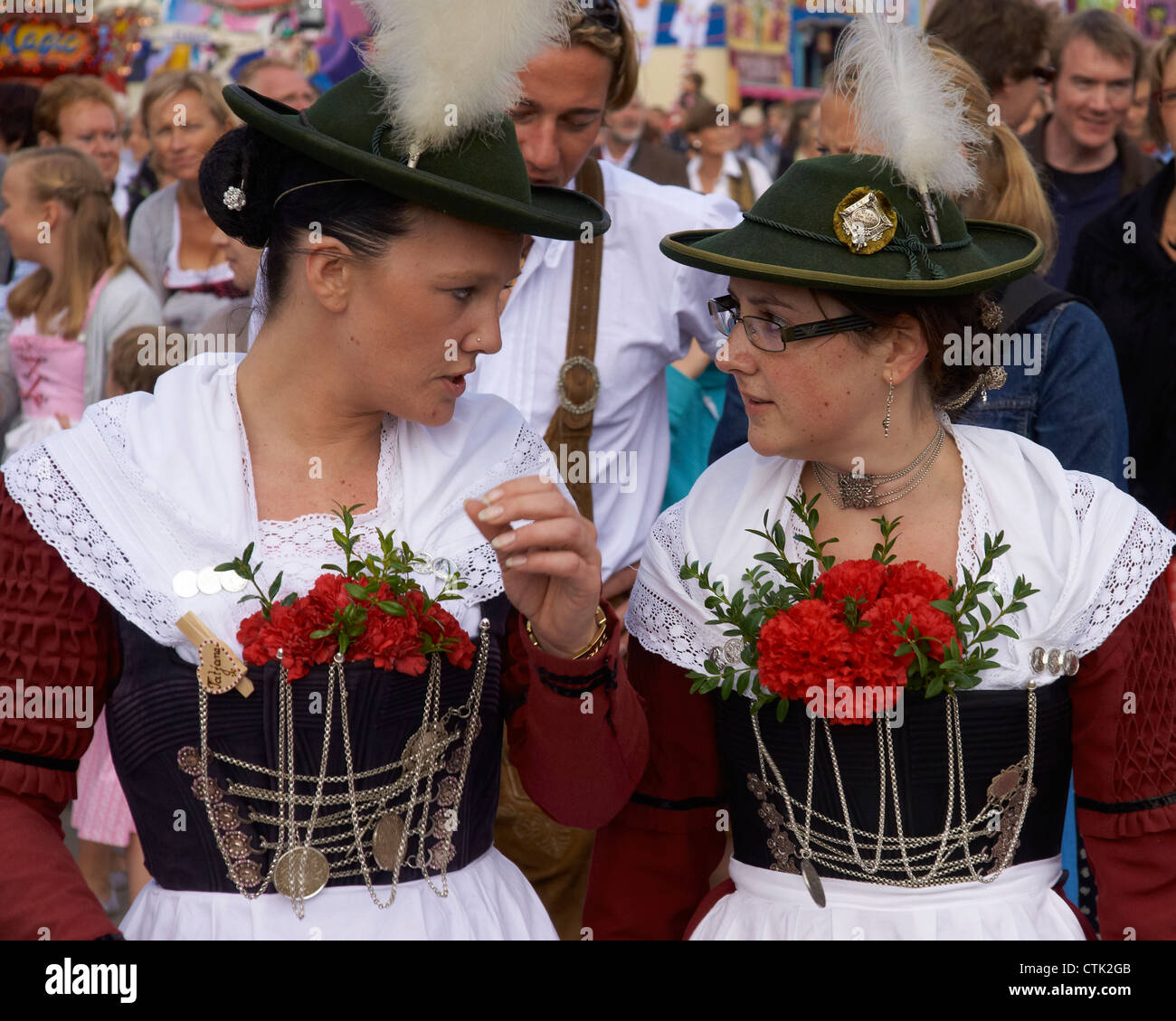 Bavarian ladies wearing their traditional Dirndl Stock Photo - Alamy