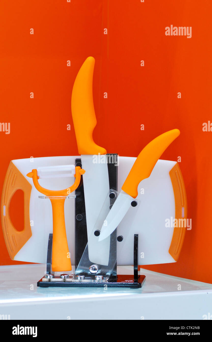 orange knife set collection with different usage Stock Photo - Alamy