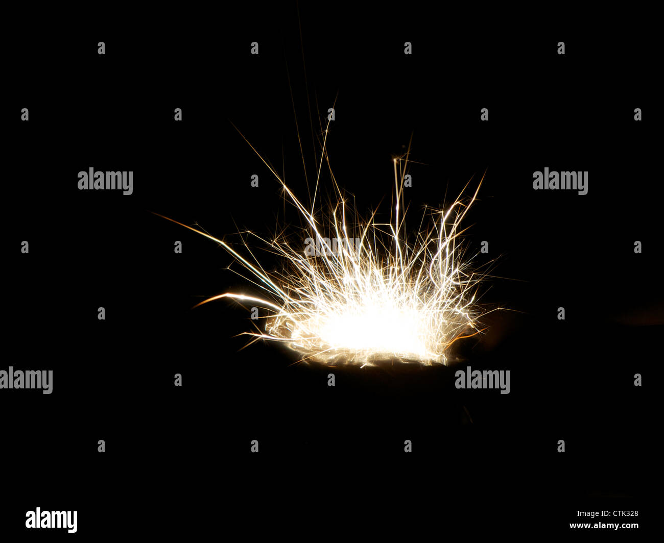 radiative spark from a lighter on the black background Stock Photo - Alamy