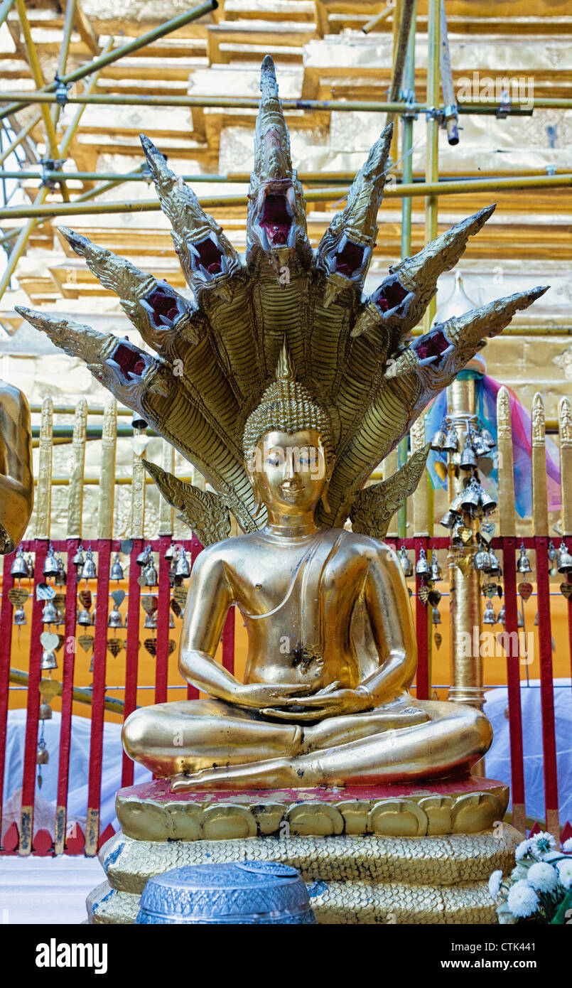 gold buddha images in front of golden temple being reconstructed Stock ...