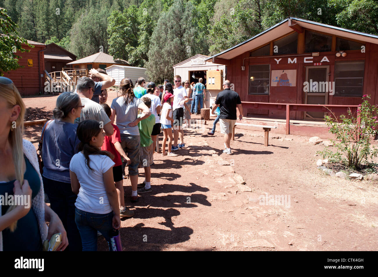 People waiting in line at the camp store, summer camp Stock Photo - Alamy