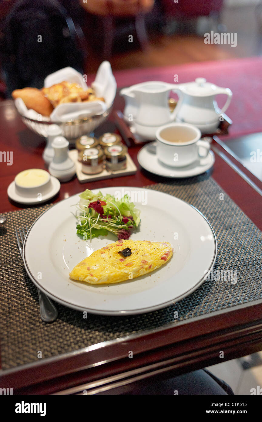 A complimentary Western styled breakfast consisting of a omelet, small ...