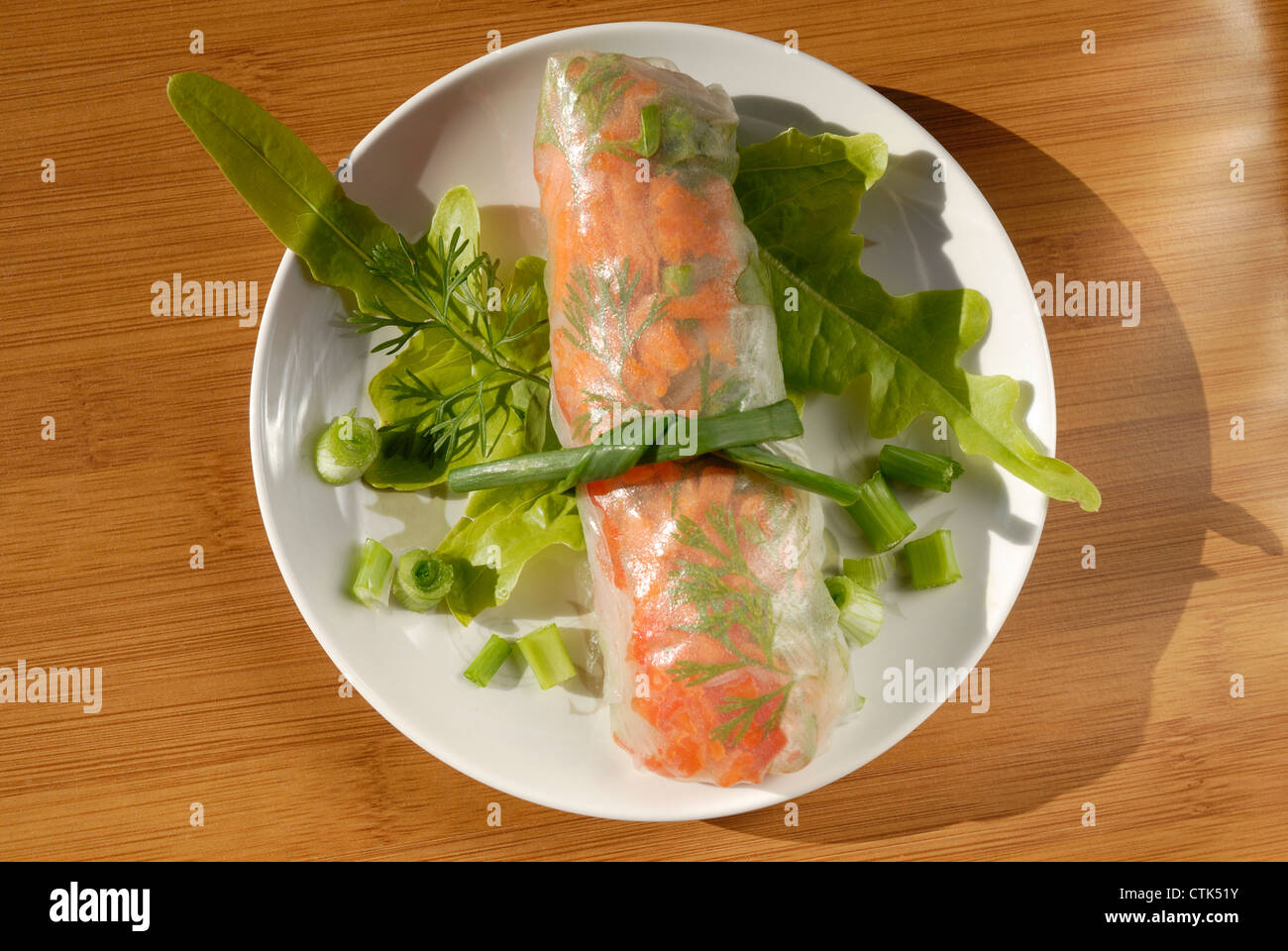 Vietnamese style Spring Roll, garnished and tied with a green onion ...