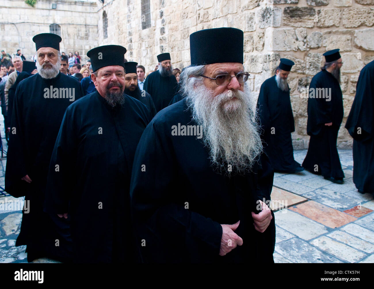 Greek Orthodox monks takes part in the Good Friday procession in ...