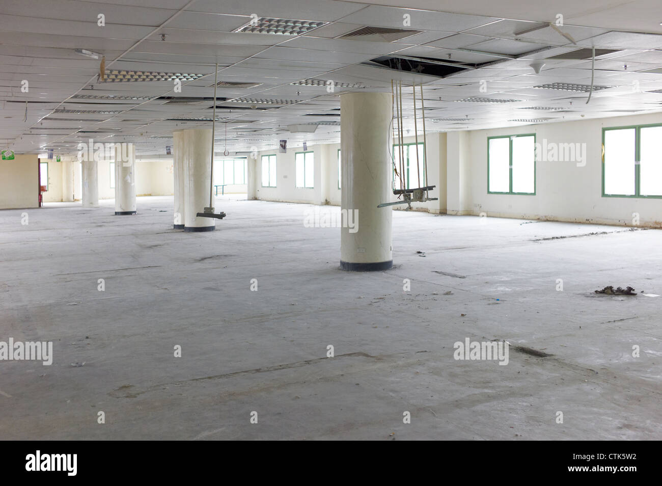 An empty abandoned office building floor Stock Photo - Alamy