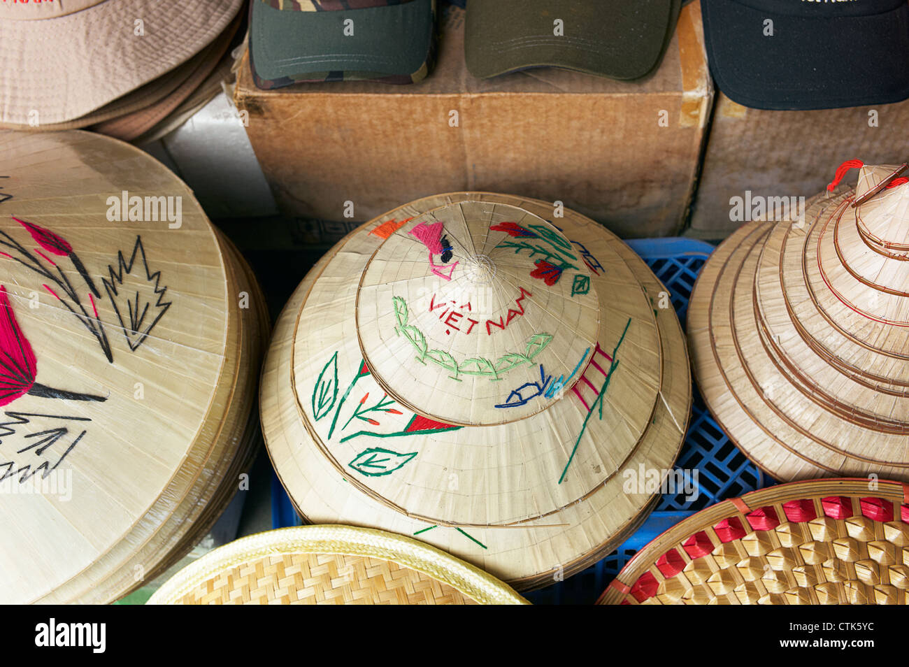 A street vendor selling a variety of modern and traditional hats Stock ...