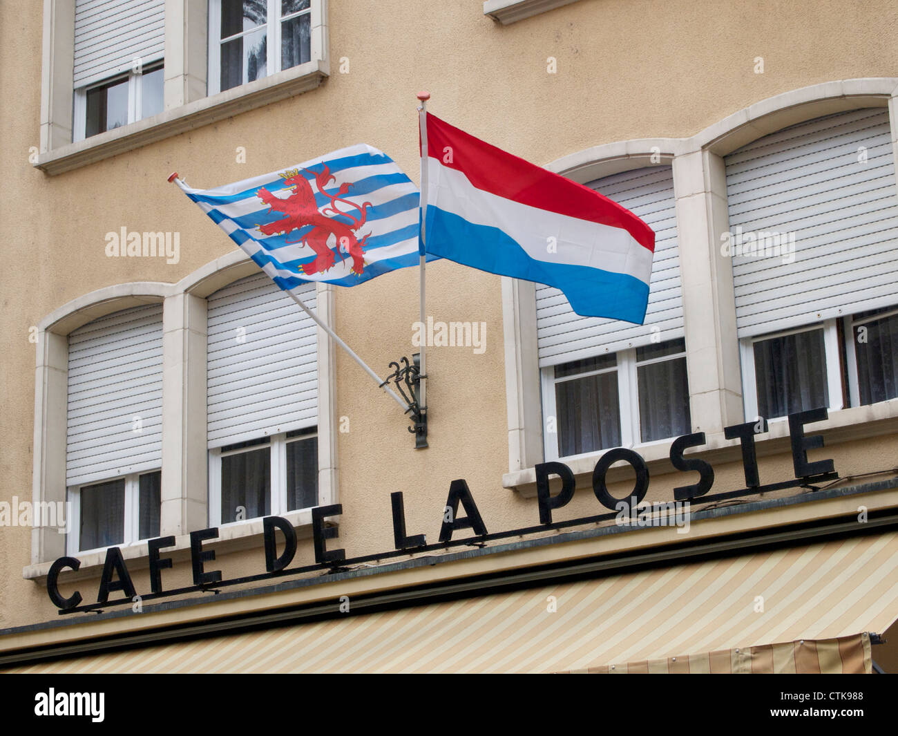 The Luxemburg national flags, left the flag of the Grand Duke, waving ...