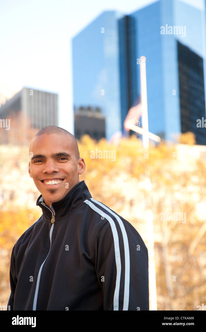 Portrait of a smiling man in zipper Stock Photo - Alamy