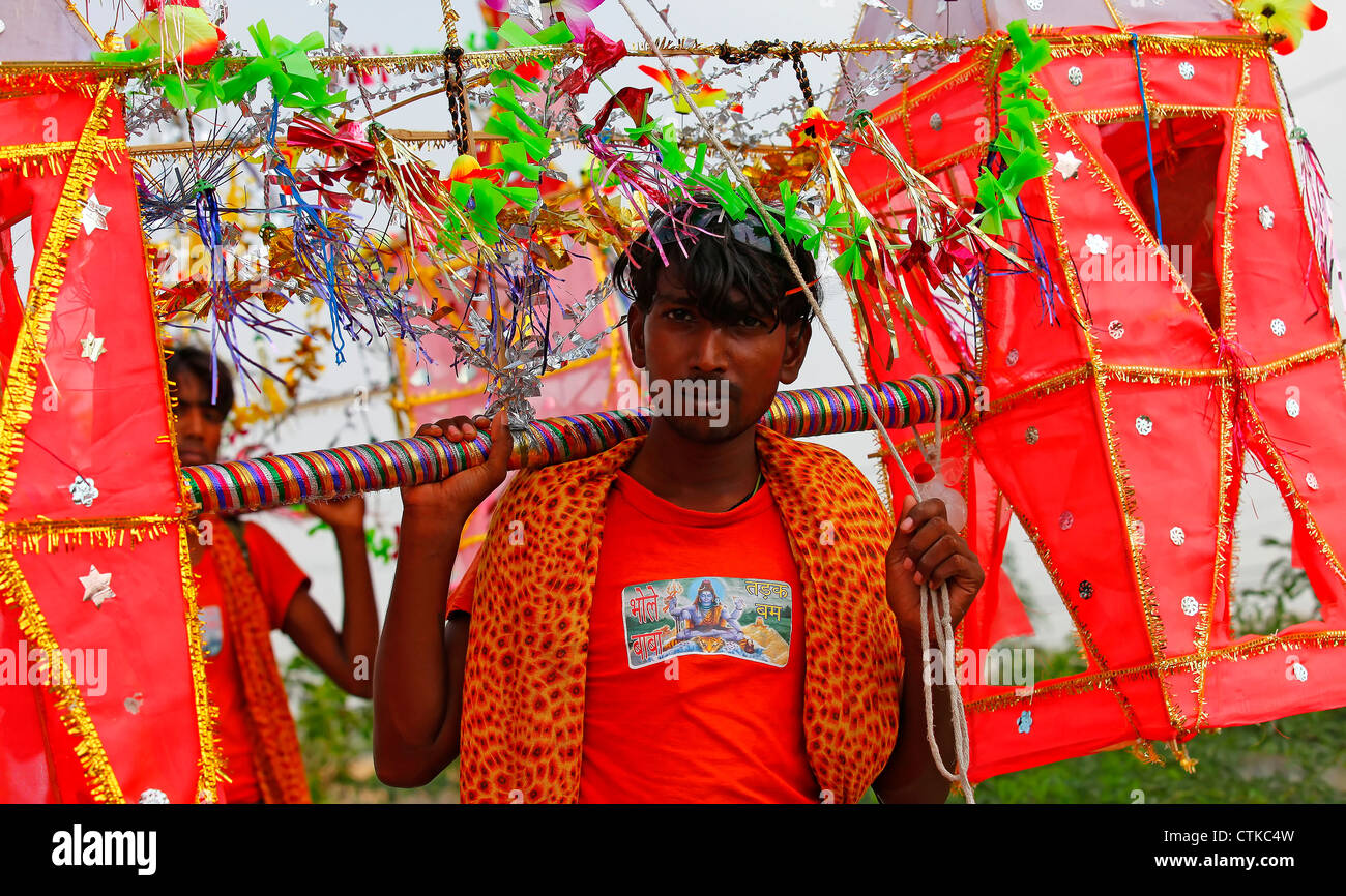 young pilgrim walking with God Shiva doli Stock Photo - Alamy