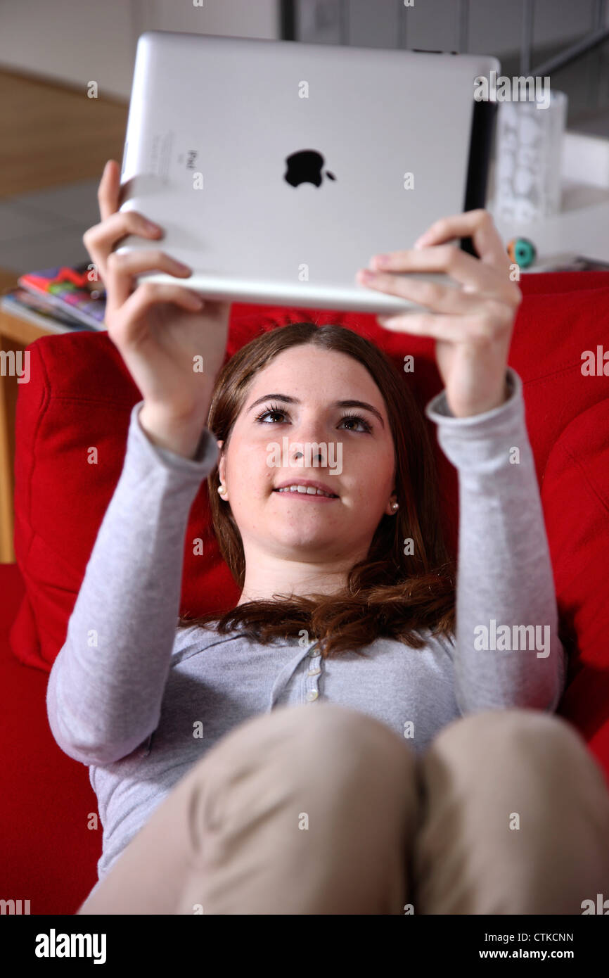 Girl using i pad hi-res stock photography and images - Alamy