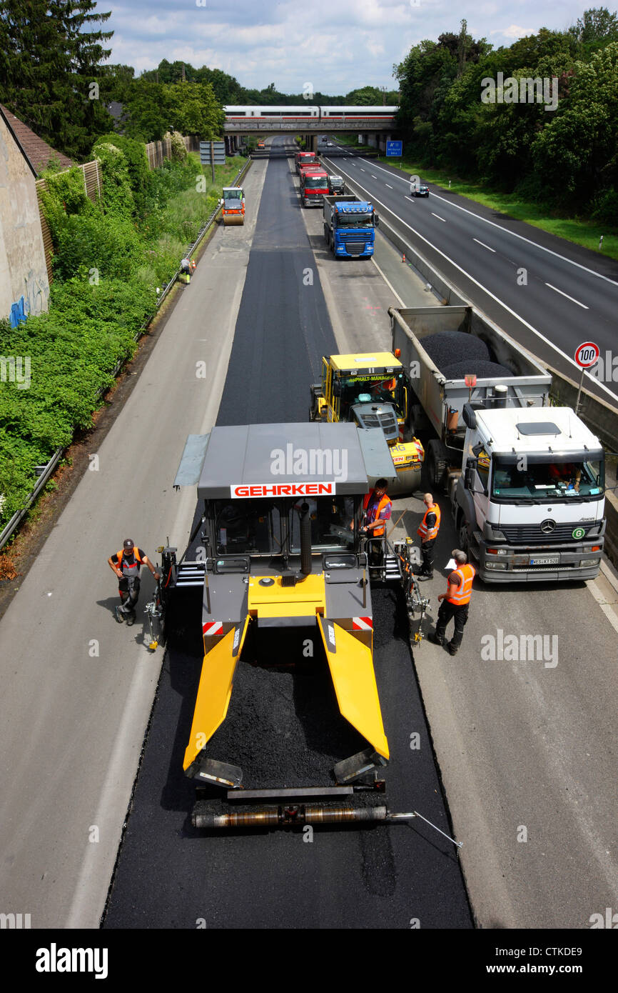 Autobahn, motorway A40, Installation of a new asphalt surface on the ...