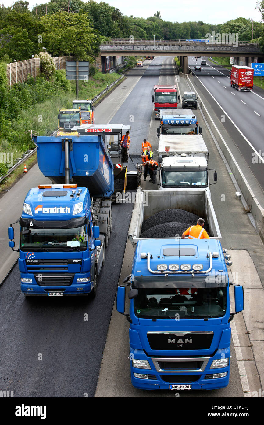 Autobahn, motorway A40, Installation of a new asphalt surface on the ...