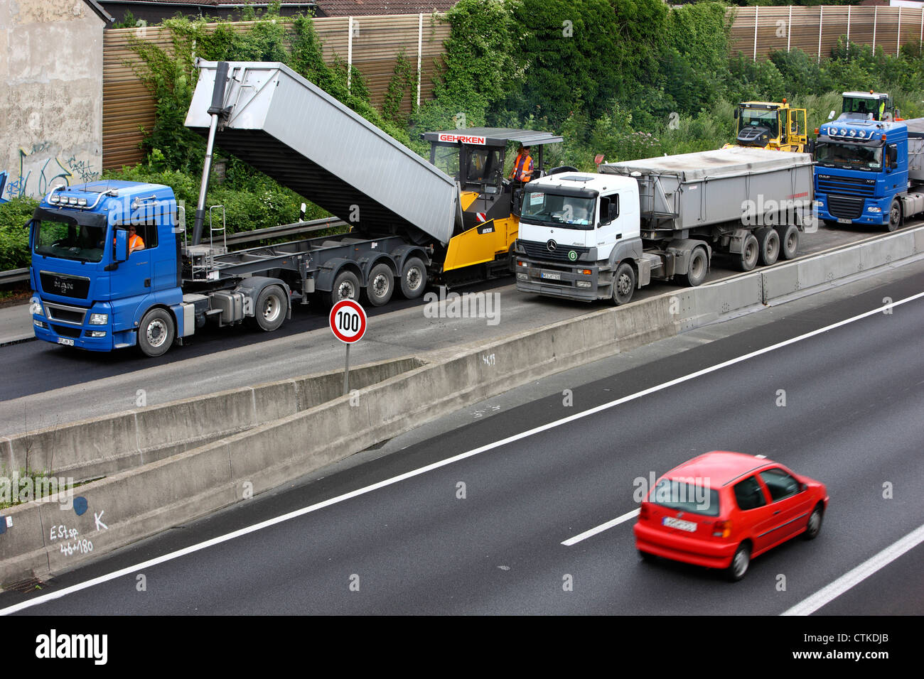 Autobahn, motorway A40, Installation of a new asphalt surface on the ...