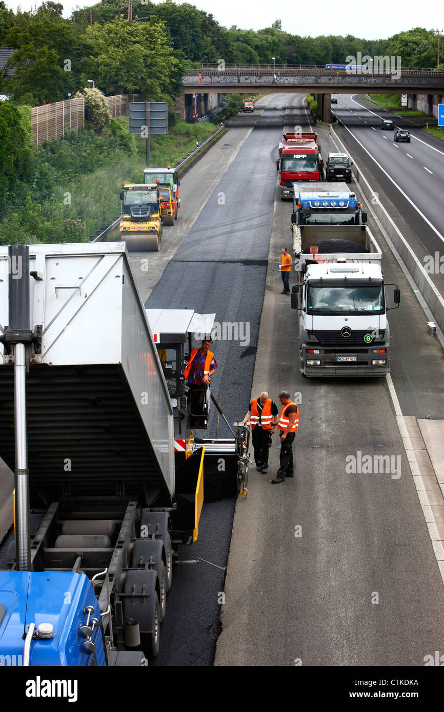 Autobahn, motorway A40, Installation of a new asphalt surface on the ...