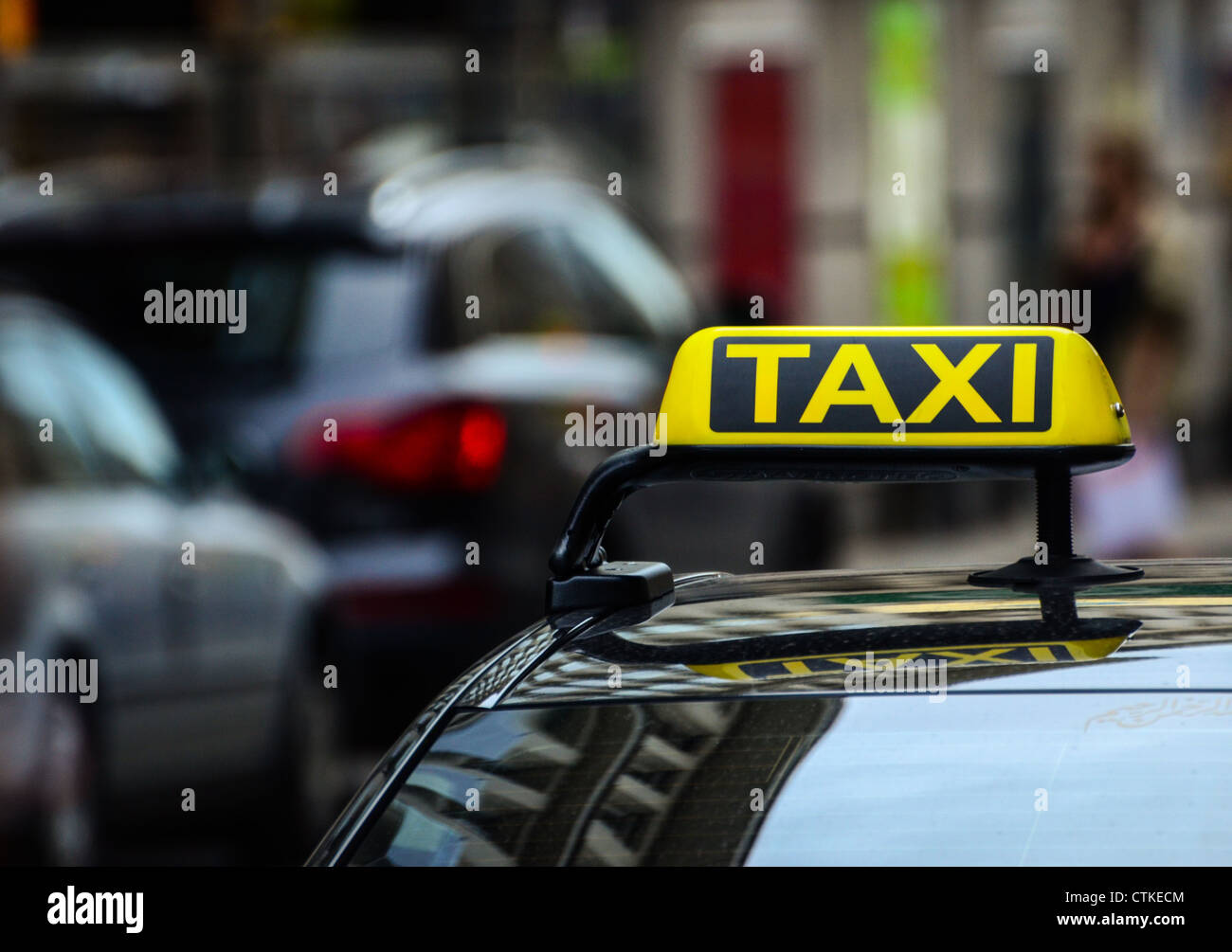 Taxi sign on car Stock Photo - Alamy