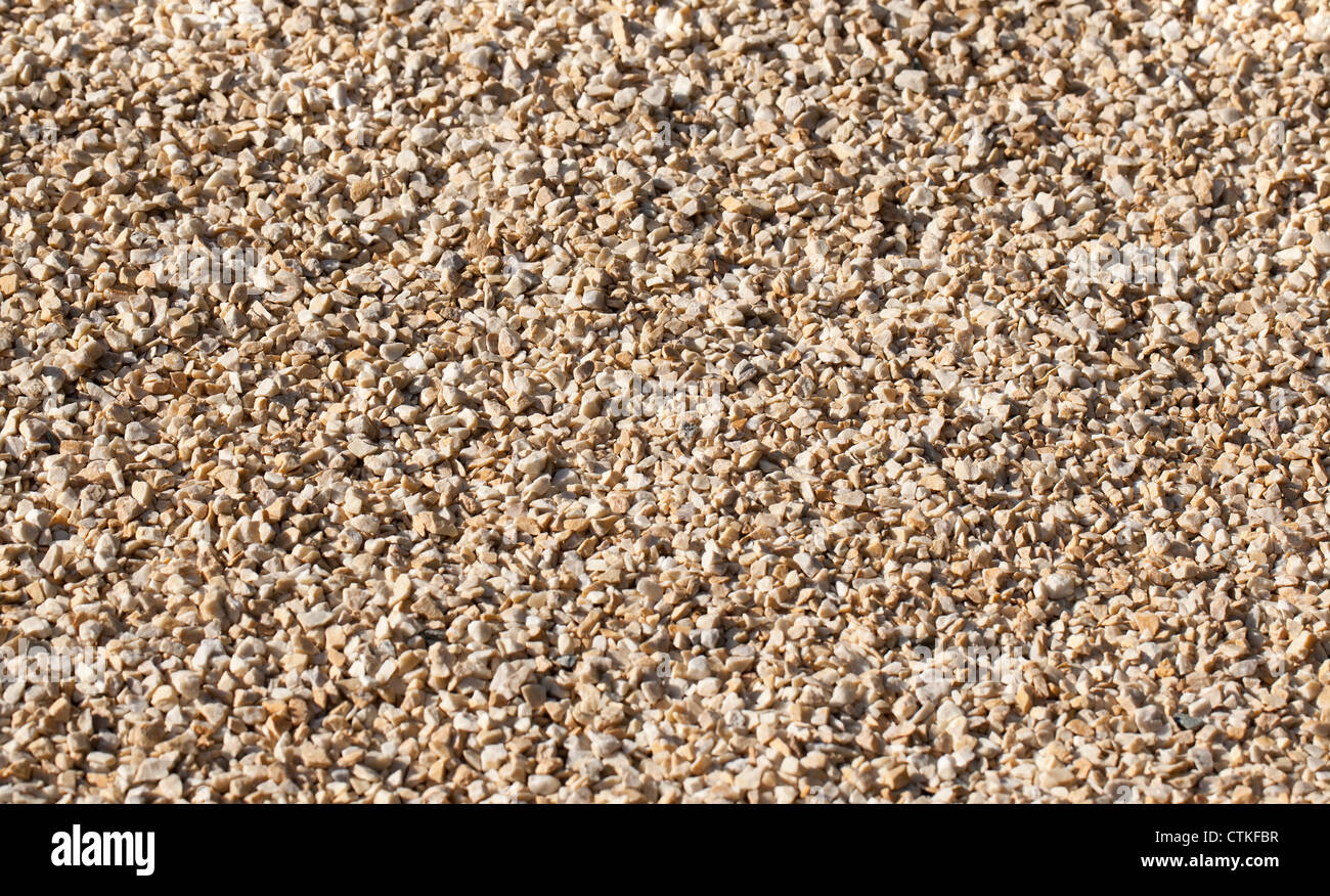 Beige small pebbles pattern Stock Photo - Alamy