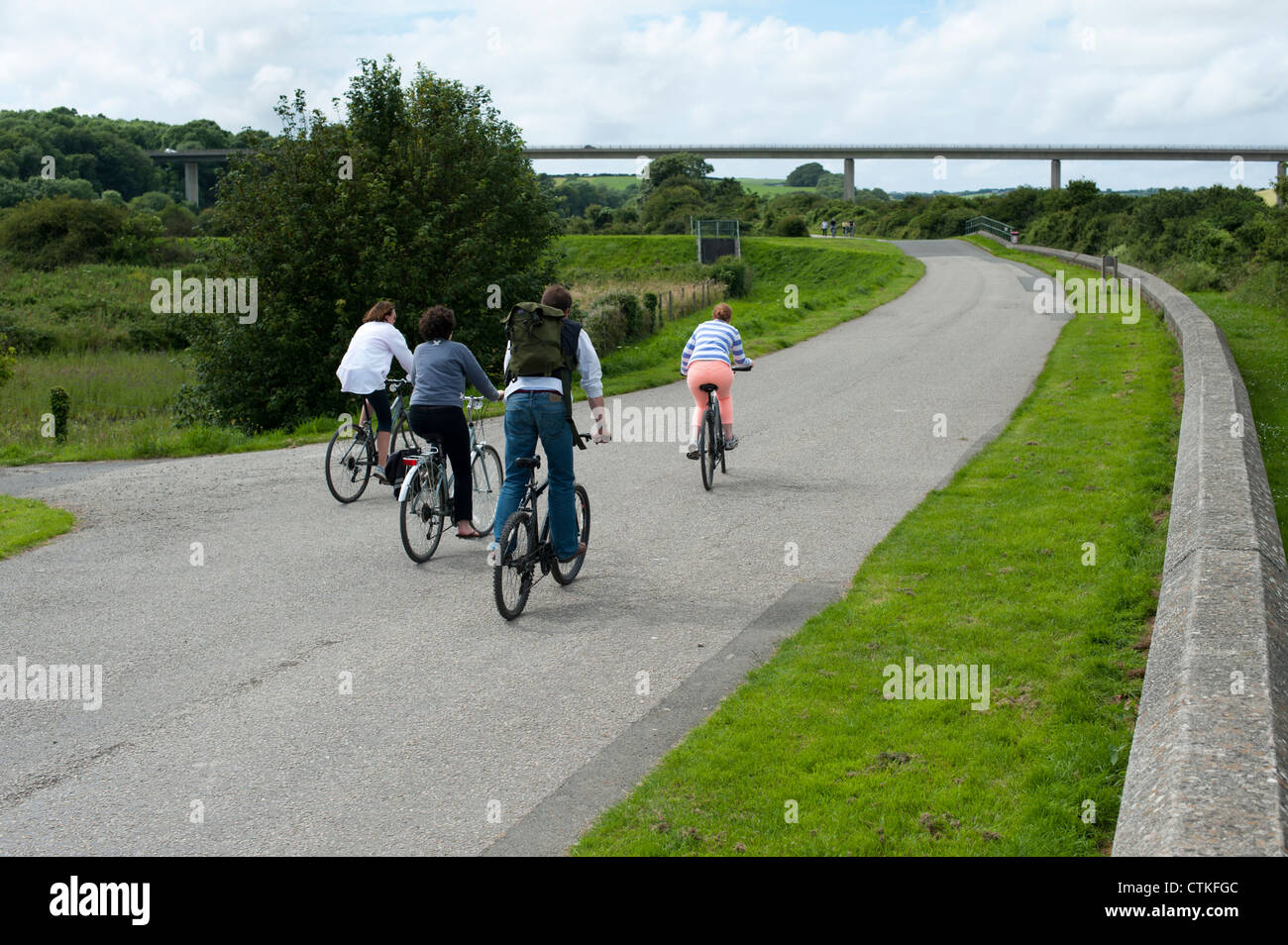 Cyclists on the Camel Trail along the River Camel, Wadebridge Cornwall ...