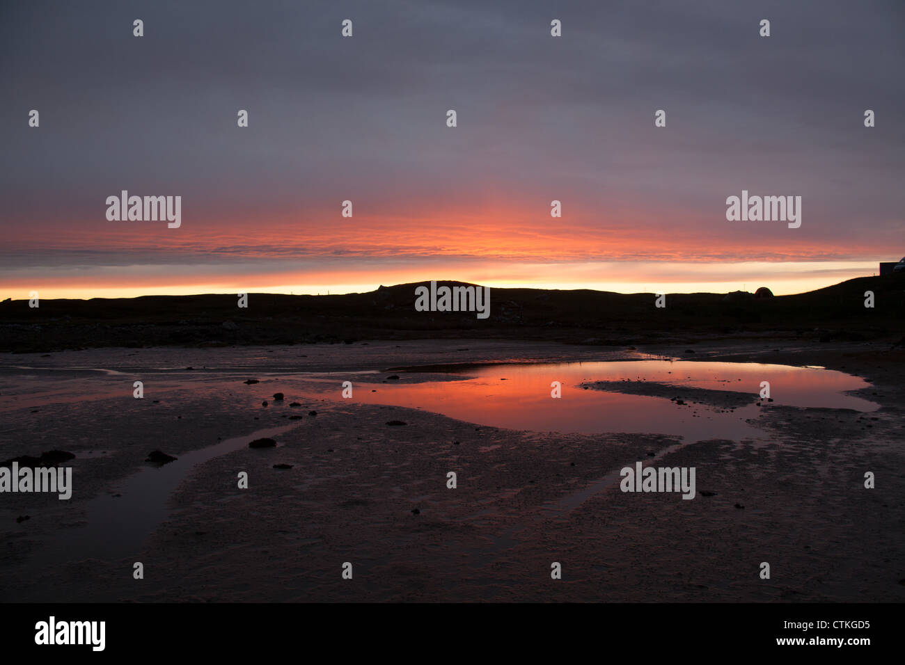 Isle of North Uist, Scotland. Picturesque view of sunset over a beach ...