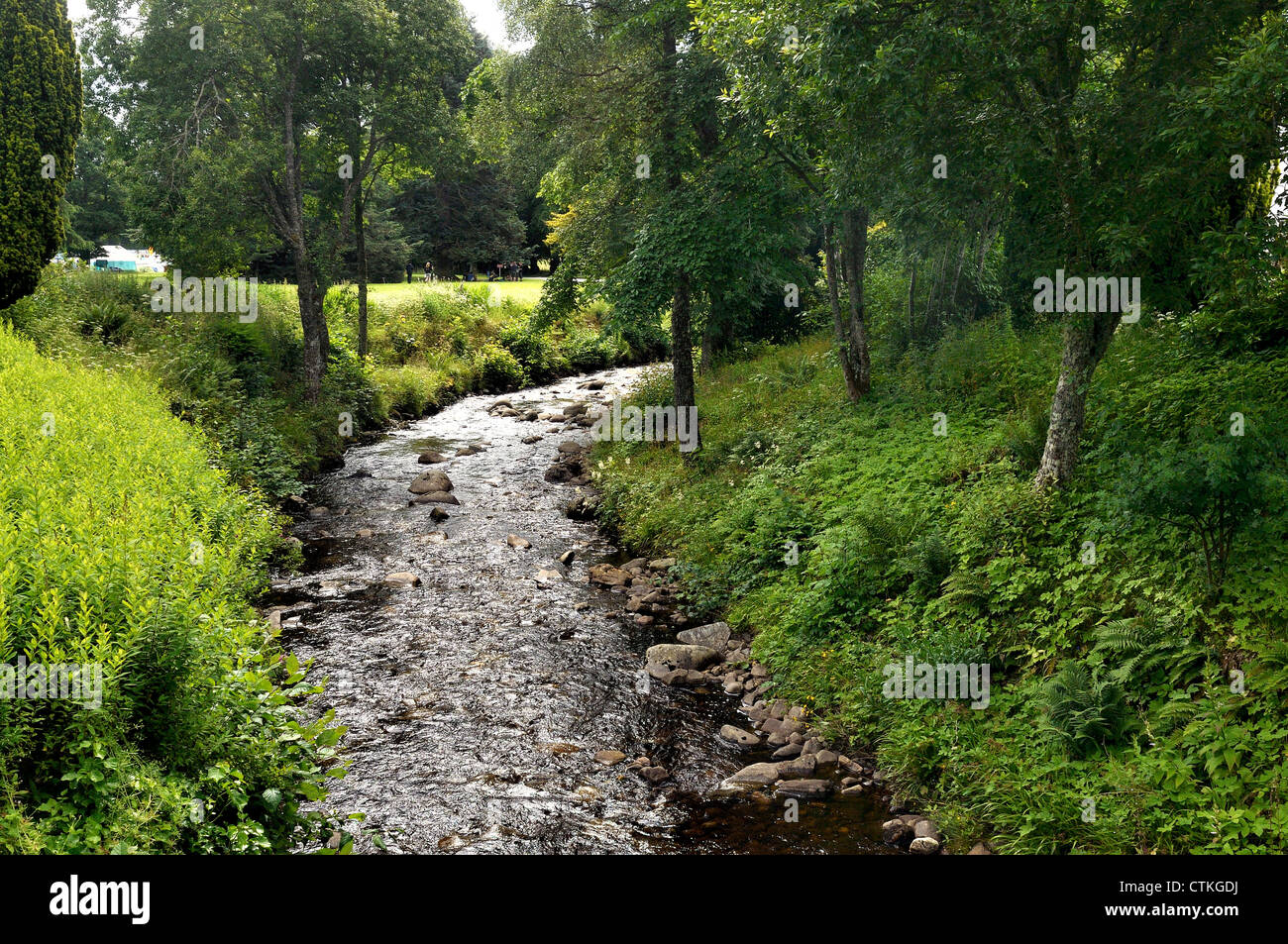 A burn (stream) running through the parkland of Blair Castle on Atholl ...