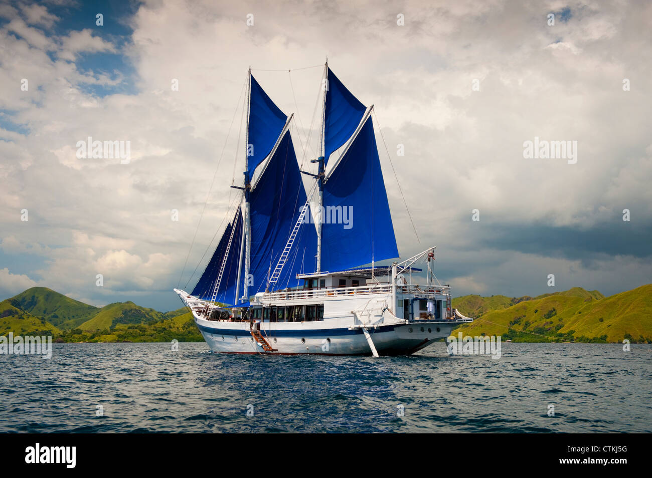 A 108 foot traditional wooden Phinisi schooner, the "Ombak Putih", here ...