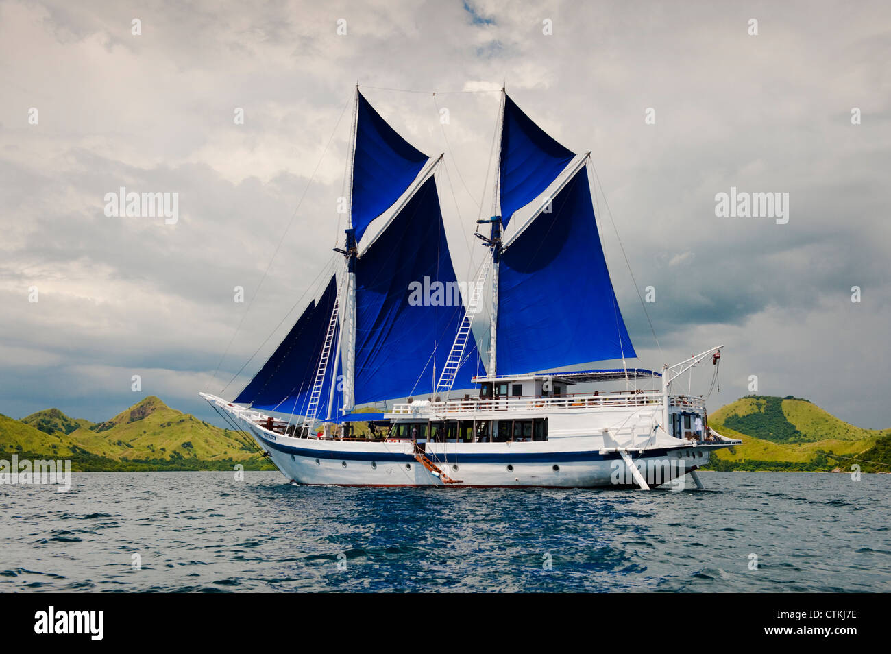 A 108 foot traditional wooden Phinisi schooner, the "Ombak Putih", here ...