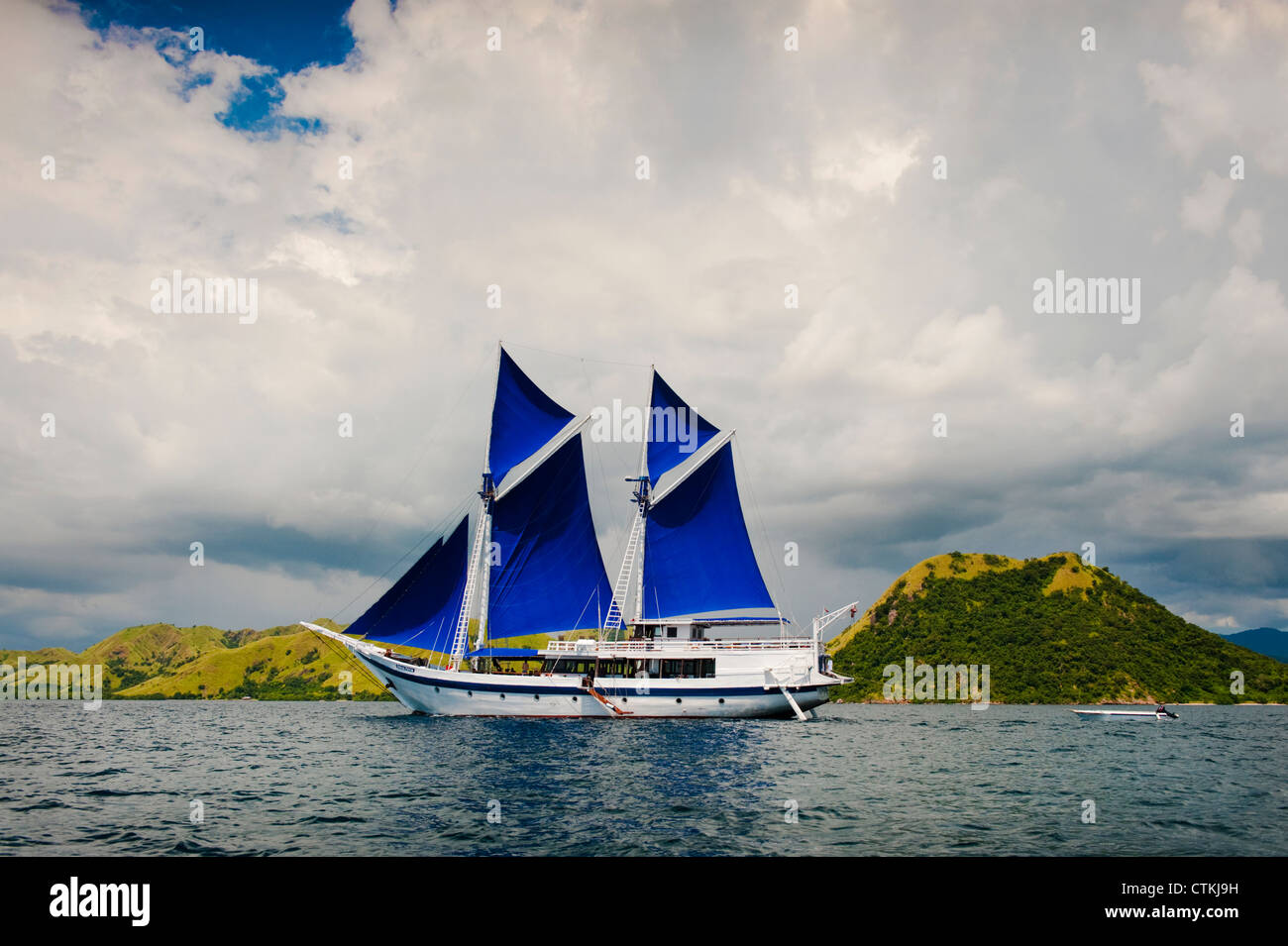 A 108 foot traditional wooden Phinisi schooner, the "Ombak Putih", here ...
