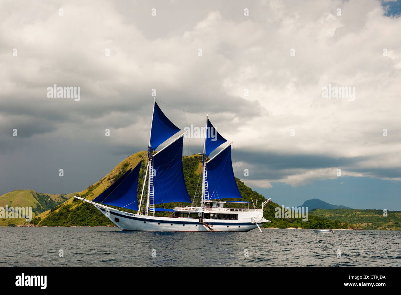 A 108 foot traditional wooden Phinisi schooner, the "Ombak Putih", here ...