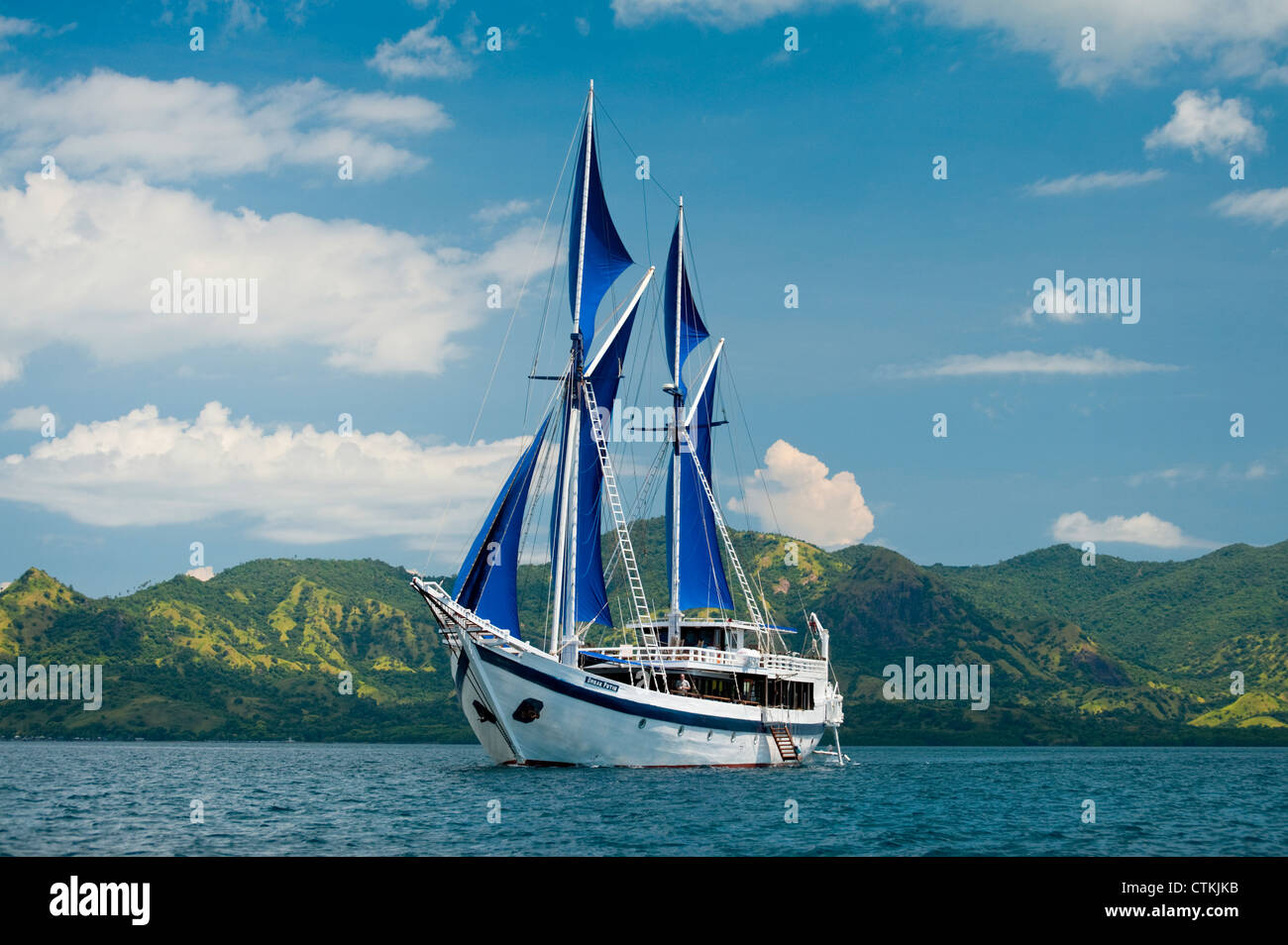 A 108 foot traditional wooden Phinisi schooner, the "Ombak Putih", here ...