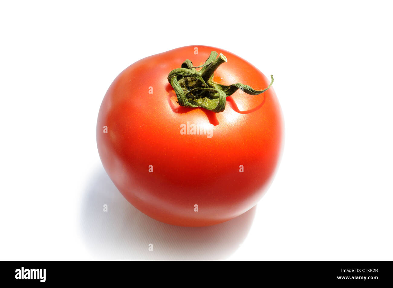 One big ripe tomato isolated on white background with clipping path ...