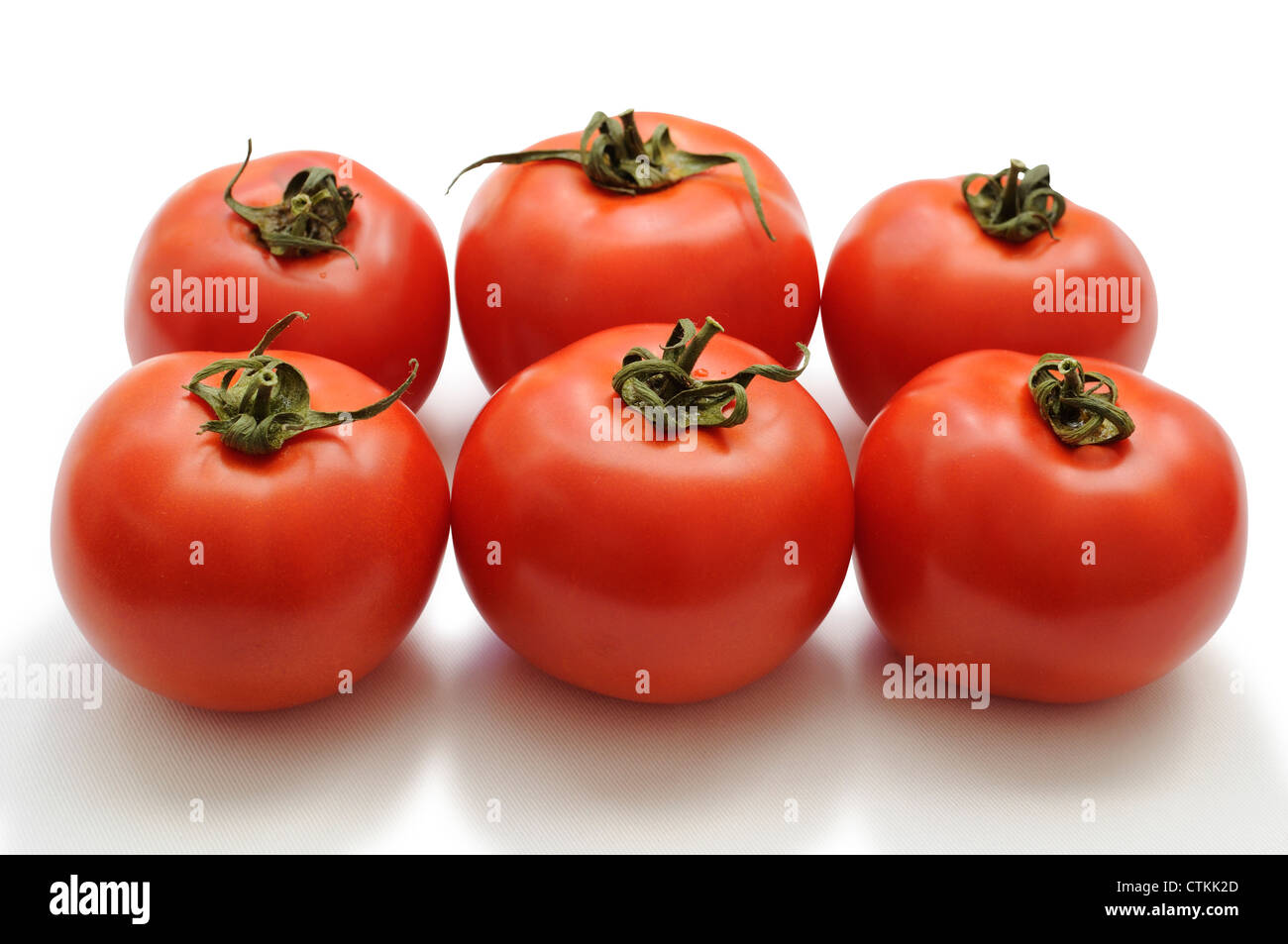 Set of six ripe tomatoes isolated on white background Stock Photo - Alamy