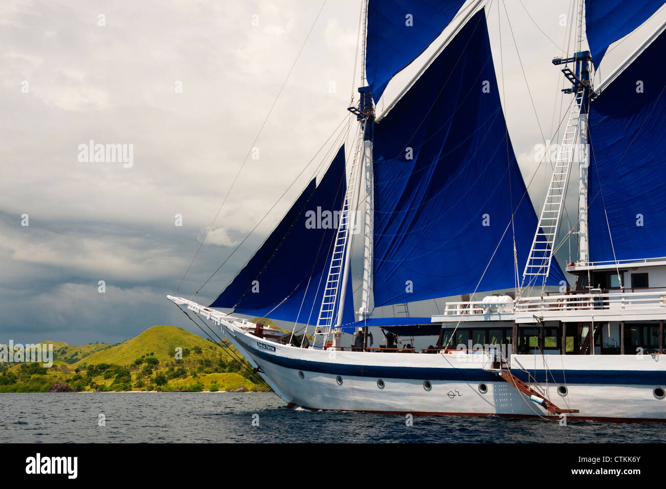 A 108 foot traditional wooden Phinisi schooner, the "Ombak Putih", here ...
