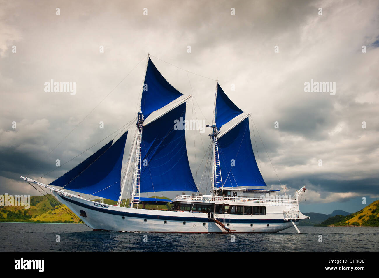 A 108 foot traditional wooden Phinisi schooner, the "Ombak Putih", here ...