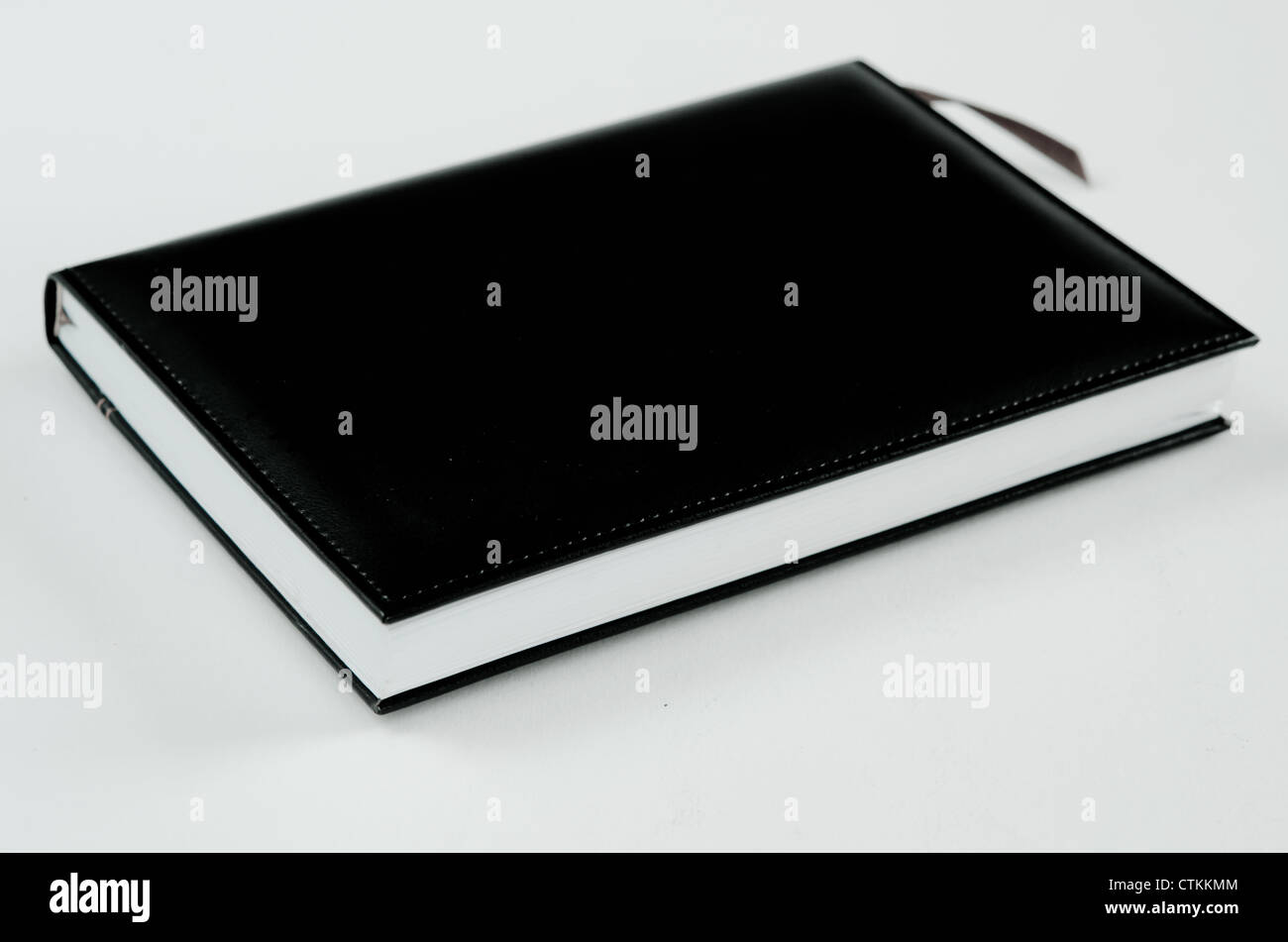 black note book and white paper on white background Stock Photo - Alamy